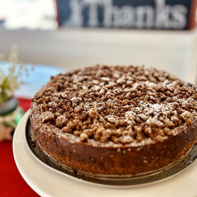 This isn't just cake—it's a streusel-topped masterpiece that would make your German grandmother weep with pride and reach for a second slice.