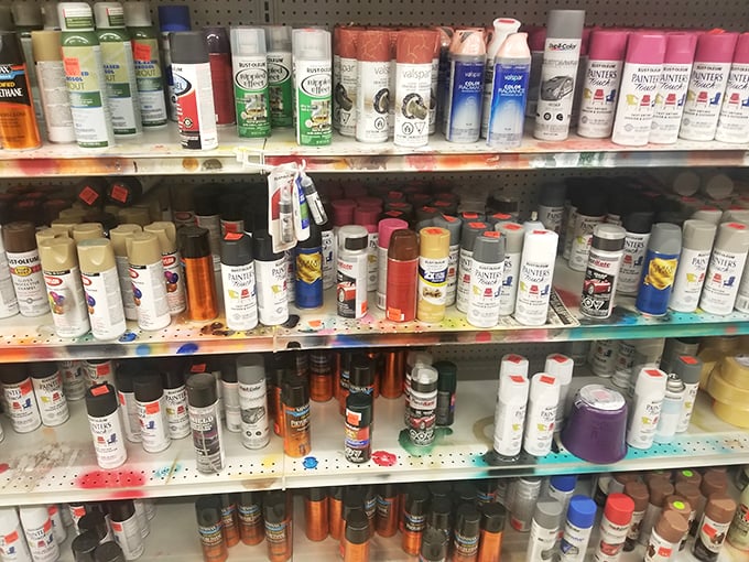The spray paint section looks like an artist's dream or a graffiti artist's retirement plan – colors upon colors at prices that inspire creativity.