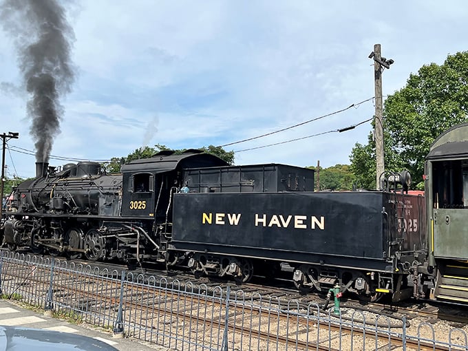 The New Haven locomotive—2,000 horsepower of pure American industrial might. That's not smoke; it's the breath of history coming to life.