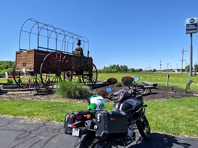 Motorcyclists know the best attractions require two-wheeled pilgrimages. This rider stopped for the obligatory "my bike is tiny compared to these wheels" photo.