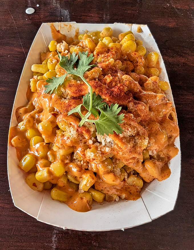 Street corn that deserves its own parade. Creamy, spicy, sweet, and savory—this side dish refuses to be upstaged by any entrée.