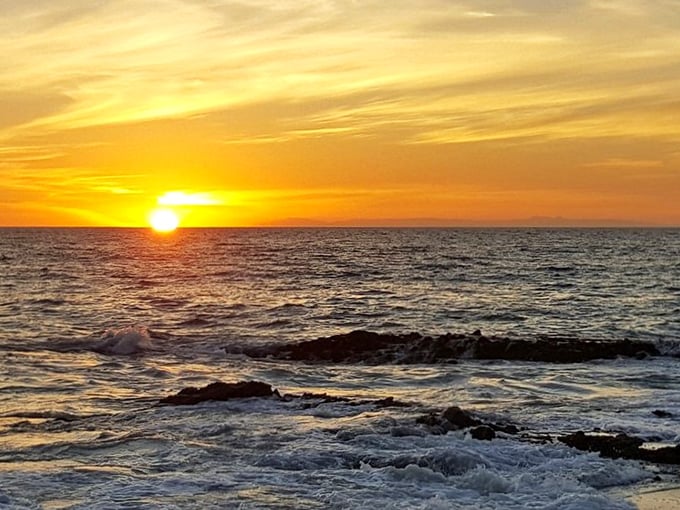 That California sunset putting on its nightly show—no tickets required, but arriving early for good seats is recommended.