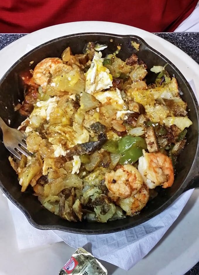 The famous Skillet Heap isn't just breakfast – it's an edible archaeological dig where each forkful reveals new treasures of potatoes, eggs, and savory surprises.