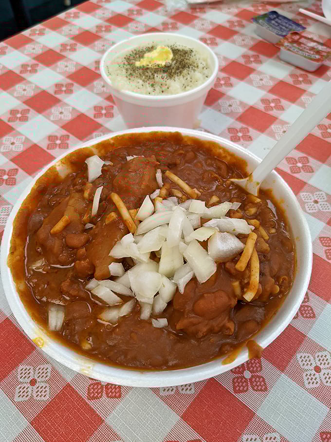 Three-way chili with diced onions—a bowl of history that's comforted Nashvillians through wars, recessions, and countless country music heartbreaks.