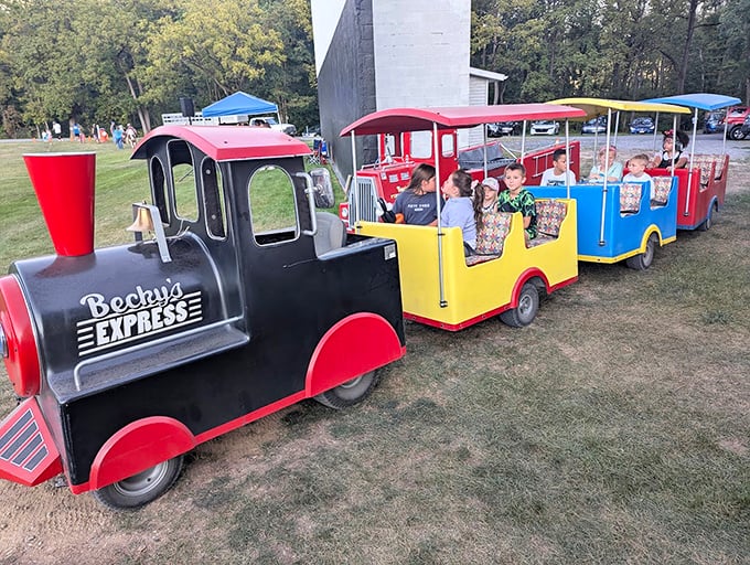 The Becky's Express chugs along with precious cargo. No tickets needed for this pre-show journey around the grounds.