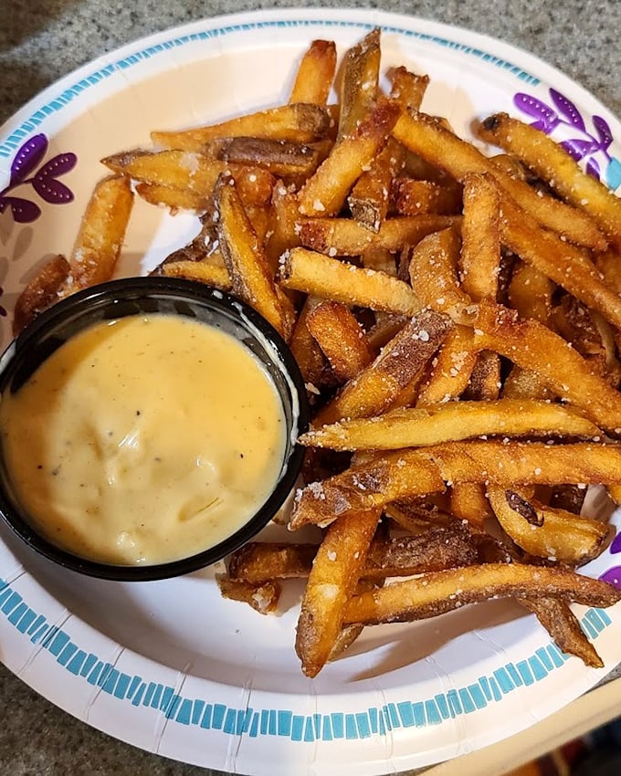These aren't just fries—they're golden vessels for truffle-infused cheese sauce. Calories that are absolutely worth every single one.