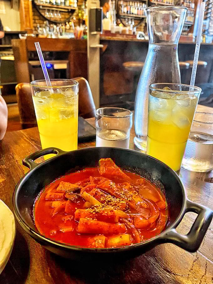 Tteokbokki swimming in spicy-sweet glory – these rice cakes know how to throw a party in your mouth.