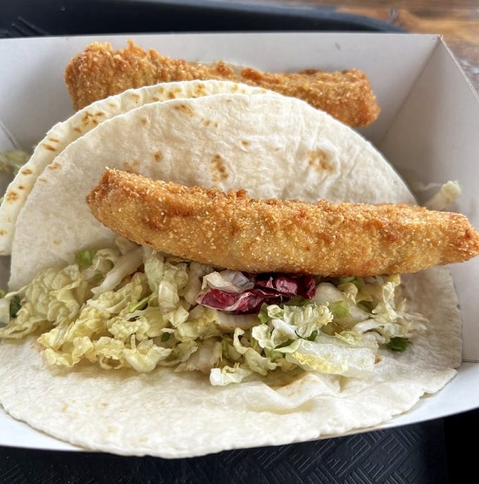 Fish tacos done right—crispy walleye nestled on fresh lettuce in a warm tortilla. Proof that Lake Erie knows a thing or two about Mexican-inspired cuisine.