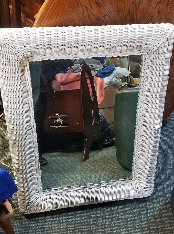 This white wicker mirror frame could transform your bathroom into a beachy retreat—reflecting your best "I woke up like this" face.