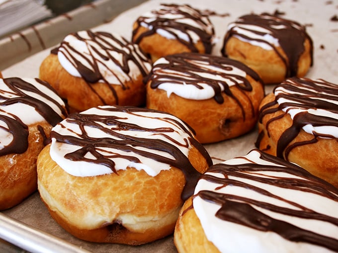 Drizzled with chocolate, these cream-filled donuts are what breakfast dreams are made of—if your dreams involve stretchy pants.