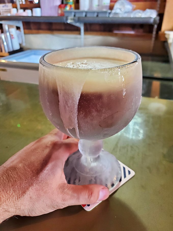 The schooner of beer so cold it sweats in anticipation of meeting barbecue. In Texas, this isn't just a drink—it's diplomatic relations.