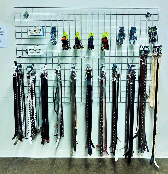 Leather belts stand at attention like soldiers in formation—ready to hold up pants and fashion standards without breaking the bank.