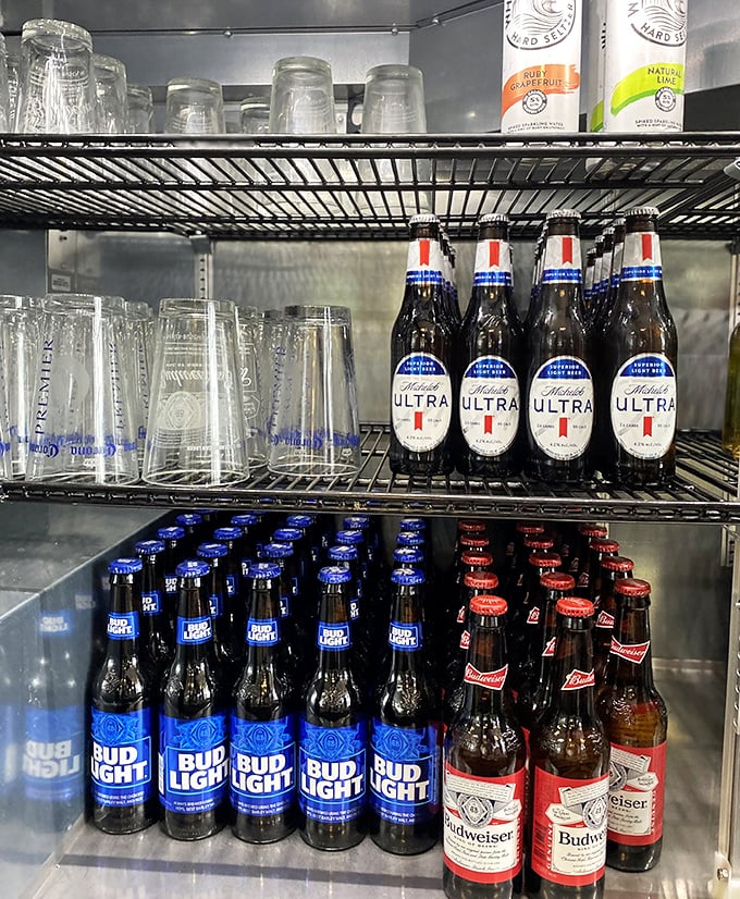 The beverage cooler speaks volumes—this is a place where cold beer and honest food create the perfect Mississippi melody.
