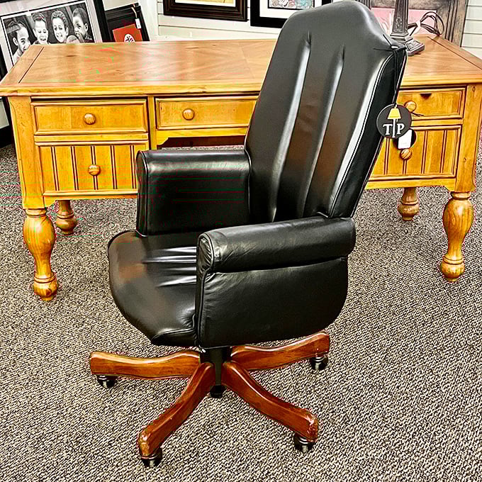 The leather executive chair that says "I make important decisions" even if those decisions are just which streaming show to binge next.