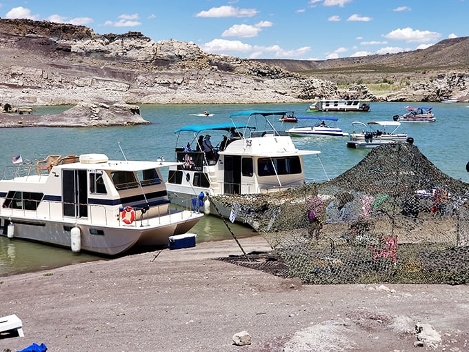 Floating neighborhoods form temporary communities on Elephant Butte's waters. These houseboats prove that some of the best real estate doesn't require a foundation.