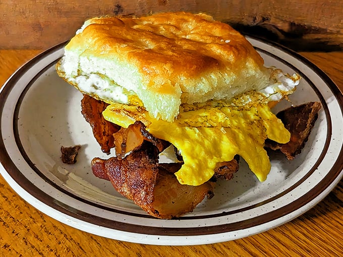 The breakfast sandwich that launched a thousand satisfied sighs – that biscuit could float away if it weren't anchored by bacon.