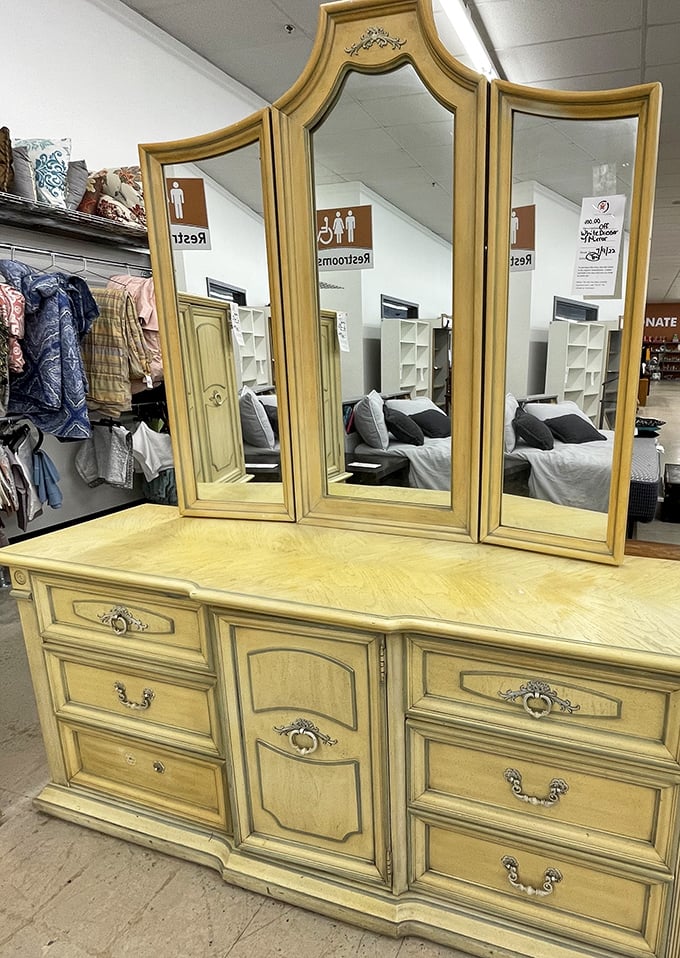 This vintage dresser with tri-fold mirror isn't just furniture—it's a time machine to when getting ready was an elegant ritual.