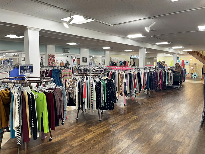 The clothing department stretches into the distance like a fashionable forest, where yesterday's trends hang patiently waiting for their inevitable comeback.