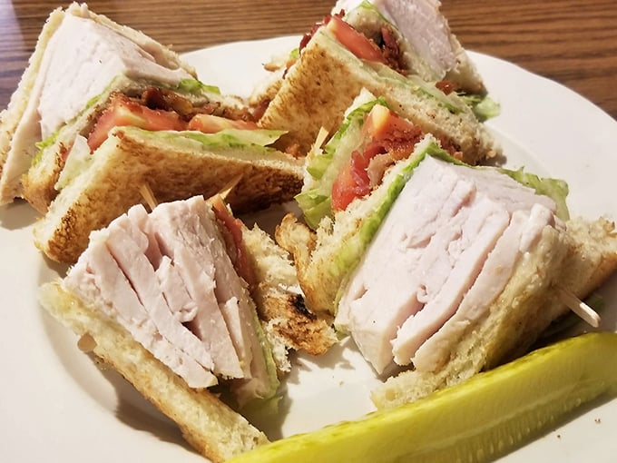 The club sandwich – architecture you can eat, with layers so perfect they'd make Frank Lloyd Wright jealous.