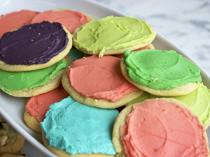 Sugar cookies wearing party clothes – these vibrant treats bring a pop of color and childlike joy to even the most sophisticated dessert table.