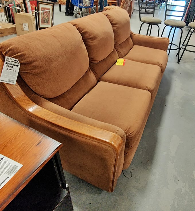 This couch has stories to tell. For under $80, you're not just buying furniture – you're adopting a conversation piece.
