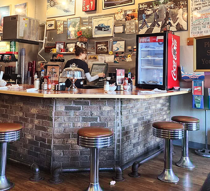 The counter – where solo diners become temporary family and the stools have witnessed more local news than the evening anchor.
