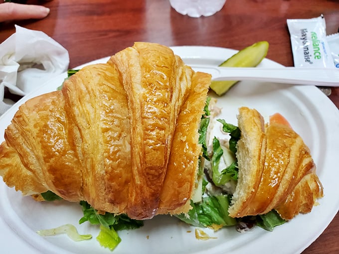 A croissant sandwich that somehow manages to be both delicate and substantial—the Fred Astaire of lunch options.