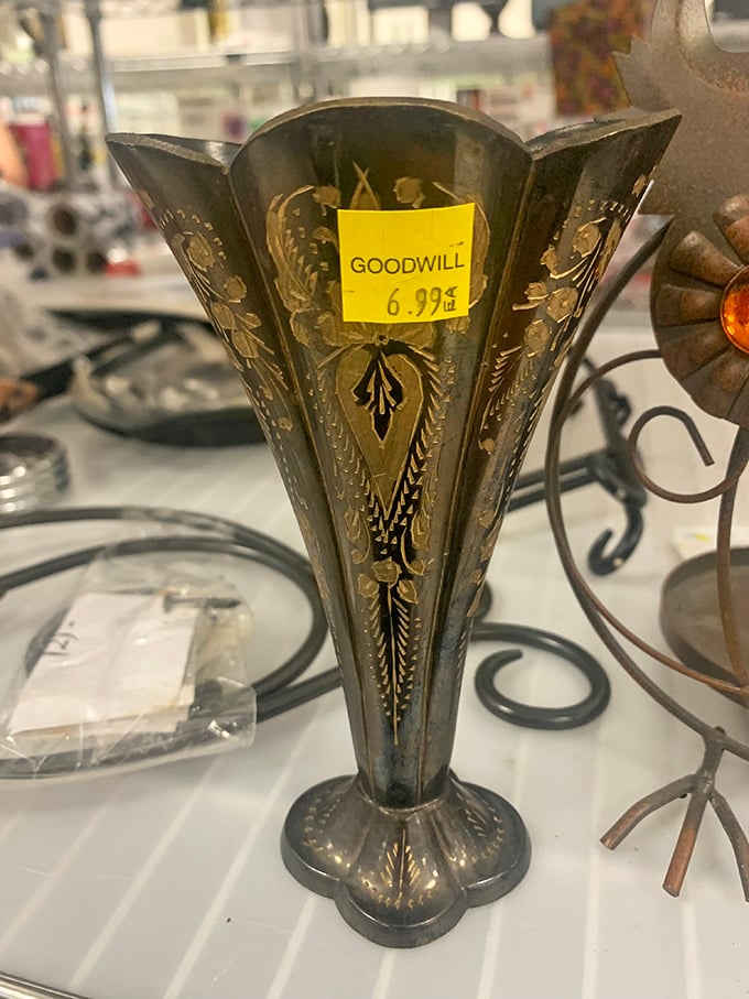 Art Deco elegance for under seven bucks. This silver vase once graced someone's formal dining table—now it awaits your fresh flowers.