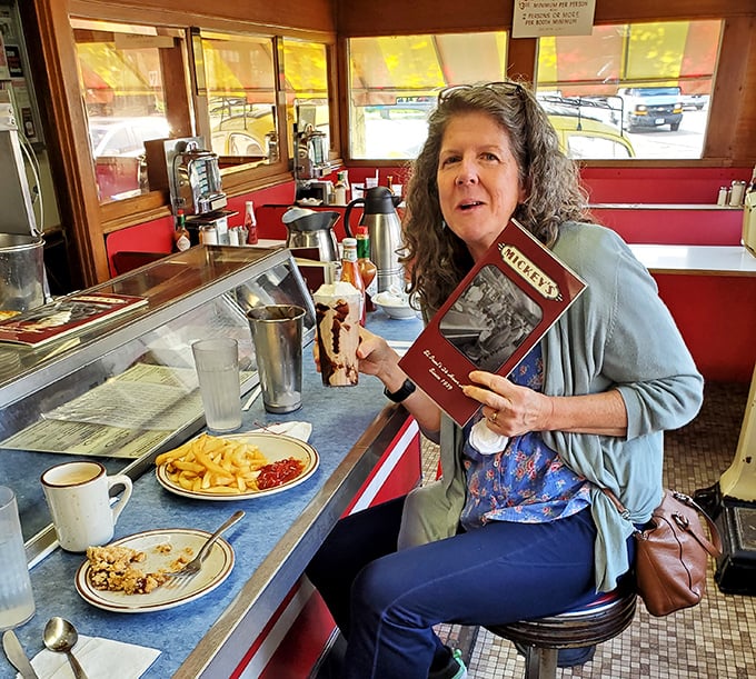 The counter experience at Mickey's offers front-row seats to the greatest show on earth: breakfast being made with decades of practiced precision.