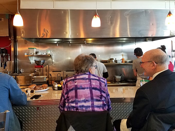The open kitchen concept: where breakfast theater happens daily. Front row seats to the symphony of sizzle and flip.