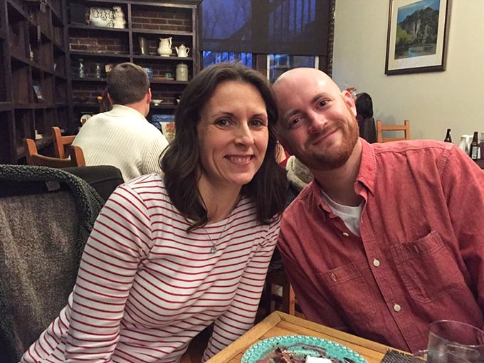 Happy diners proving that good food creates instant friendships – or maybe that's the wine talking.