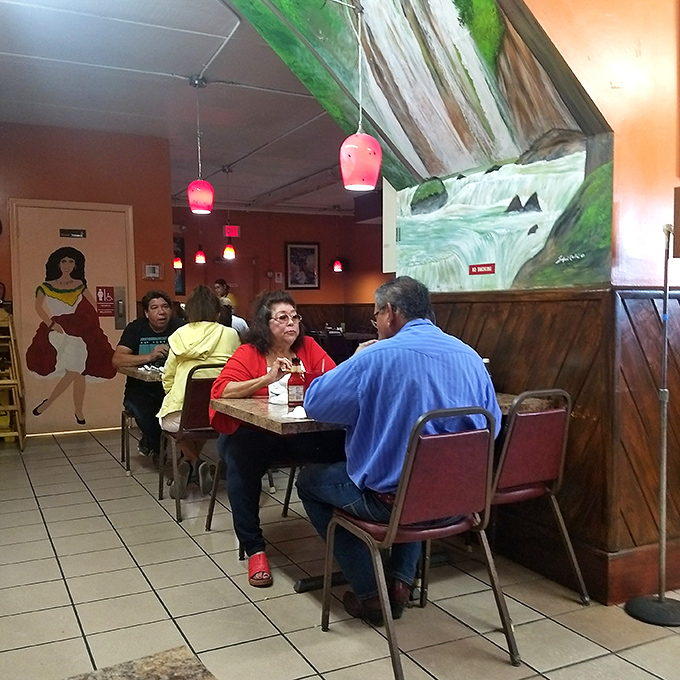 The dining room buzzes with conversation and satisfaction – where locals and travelers alike bond over the universal language of exceptional food.