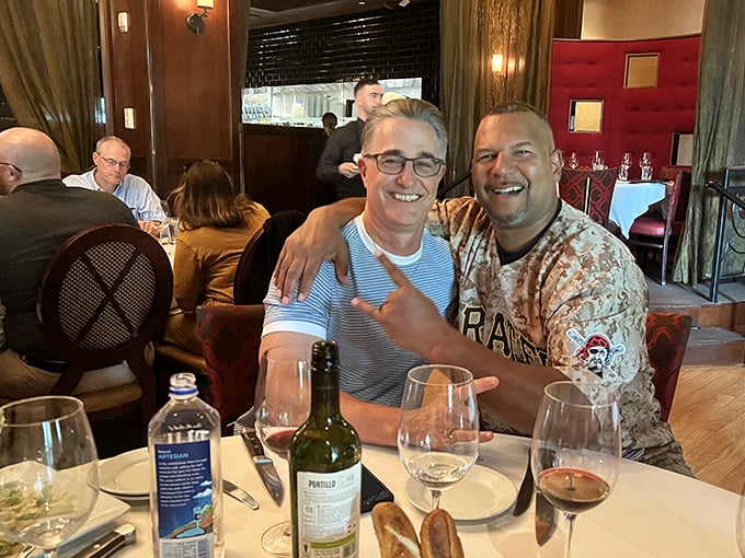The dining room buzzes with the energy of good times and great food, where Pittsburgh sports fans and business deals find common ground over premium beef.