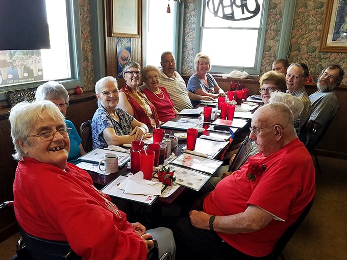 The morning coffee club in session—where world problems are solved, local gossip is exchanged, and friendships have spanned decades over countless refills.