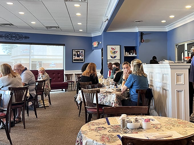 The breakfast buzz in full swing—a symphony of coffee cups clinking, forks scraping plates, and the satisfied murmurs of people starting their day right.