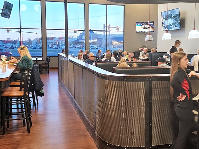 The bar area buzzes with the energy of a place where everybody might not know your name yet, but they're certainly willing to learn it.