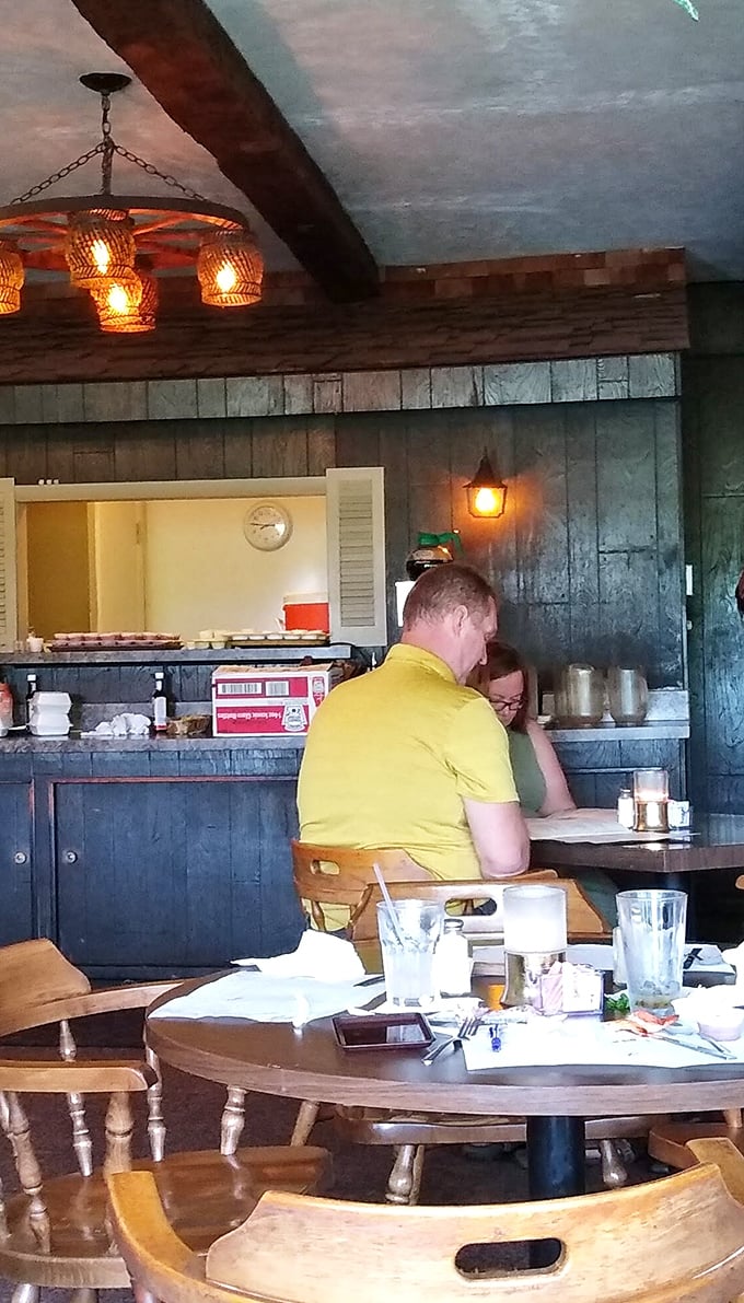 The warm wood paneling and soft lighting create that perfect ambiance where calories don't count and diet plans go to die.