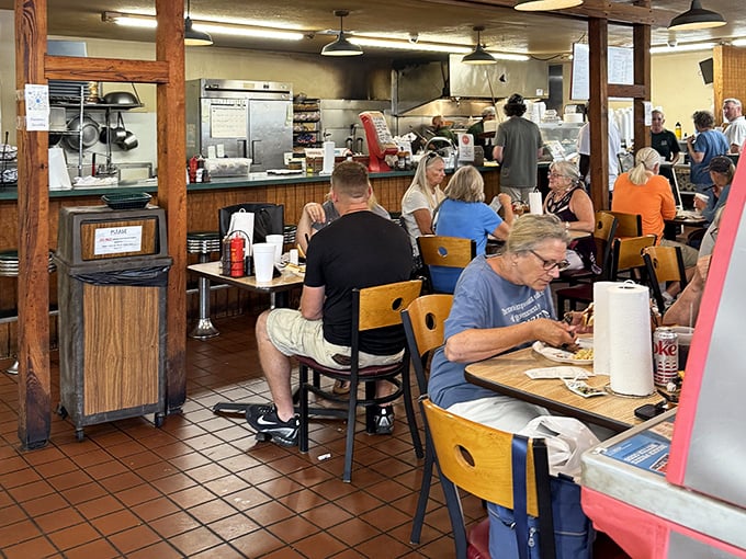 A packed house of happy diners – the universal sign that you've found the real deal. Notice nobody's looking at their phones? The food demands full attention.