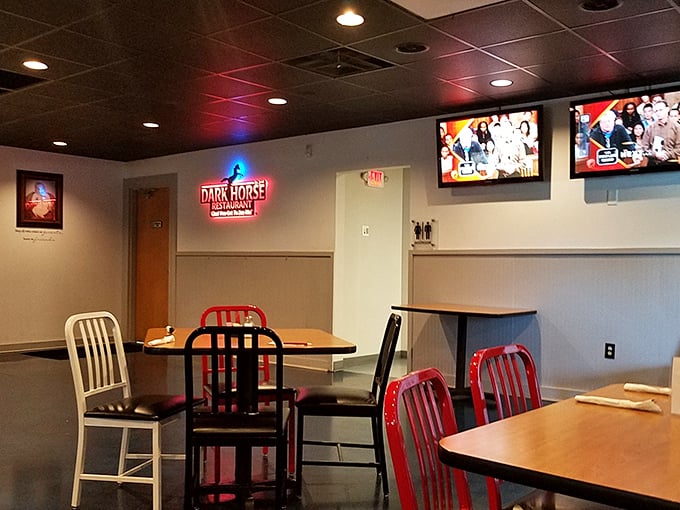 The dining area's warm lighting and mix of seating creates that "everybody knows your name" vibe that chain restaurants spend millions trying to fake.