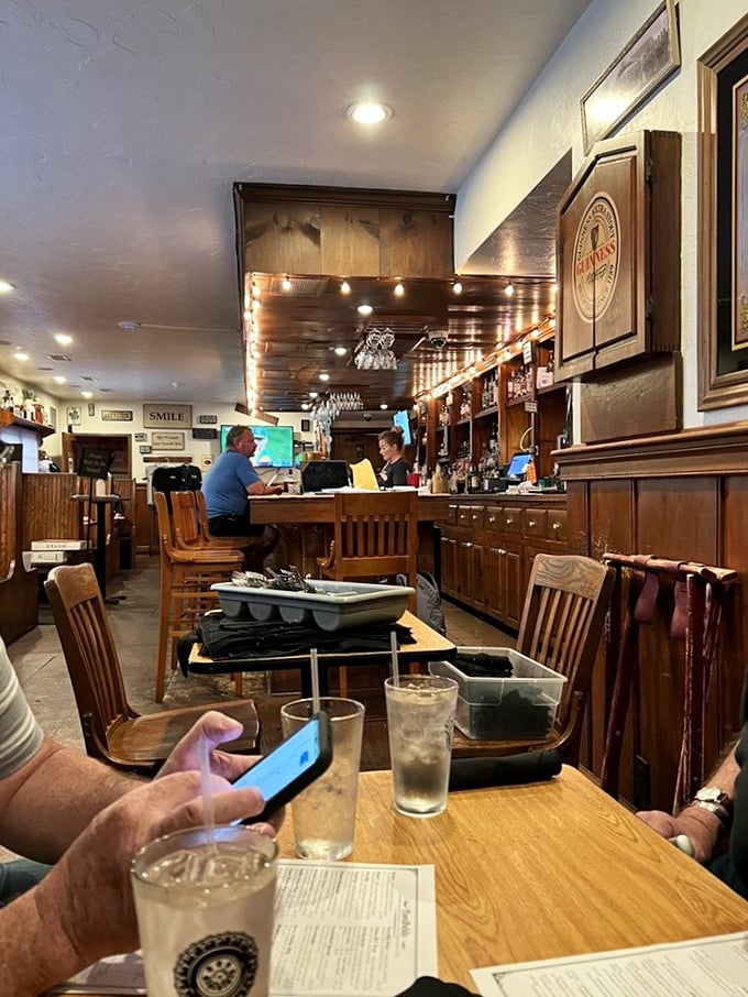 The bar area invites you to pull up a stool, order something delicious, and settle in for conversations that might just last until closing time.