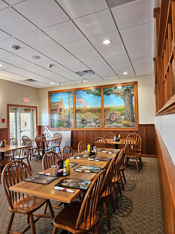 Rural Americana on the walls, comfort on the tables – this dining room has hosted more family celebrations than most wedding venues.