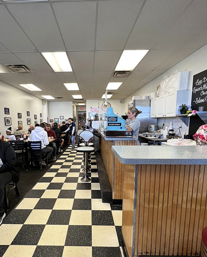 The bustling dining room on a typical morning—where strangers become neighbors and everyone speaks the universal language of "pass the syrup."