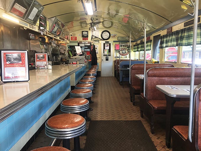 The classic diner interior—where conversations flow as freely as the coffee, and everyone feels like a regular.