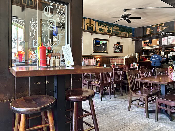 The dining area feels like your favorite uncle's den – if your uncle had impeccable taste in comfort food and neighborhood gathering spots.