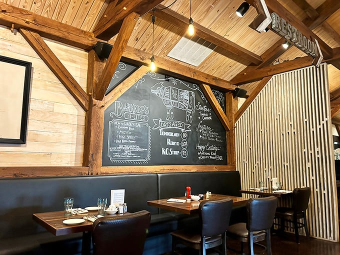 Exposed beams, warm wood, and chalkboard menus create that rare dining space that feels both special and comfortable—like wearing your best jeans.
