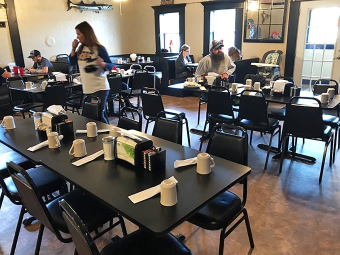 Tables set and waiting for the morning rush—each one a potential stage for family reunions, friendly debates, and first dates.