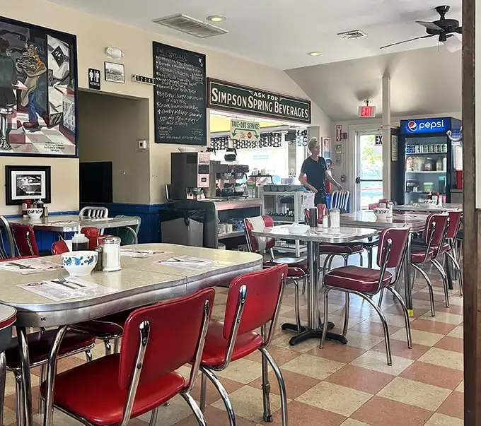 Classic diner aesthetics done right. Those red chairs aren't just seating—they're front-row tickets to the greatest show on earth: breakfast.