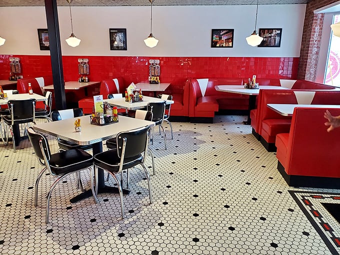 Red booths and chrome-trimmed tables aren't just furniture – they're front-row seats to the greatest show in Nashville: authentic American comfort food.
