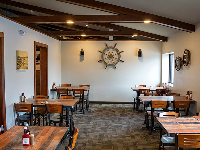 The ship's wheel on the wall isn't just decoration—it's steering you toward your next delicious destination in this sea of comfort food.