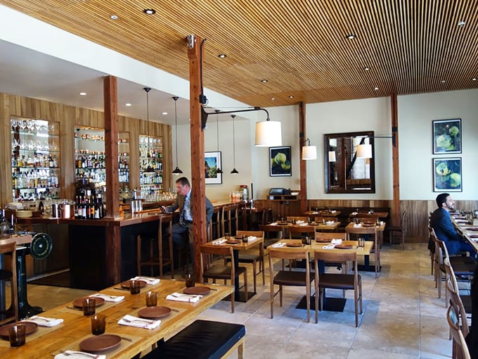 The dining room balances warmth and elegance like an old friend who somehow always dresses better than you.